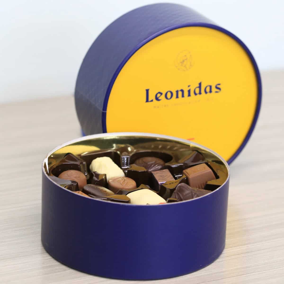 Buy 'Dora' round box of Leonidas Chocolates Online | Le Bouquet Montreal